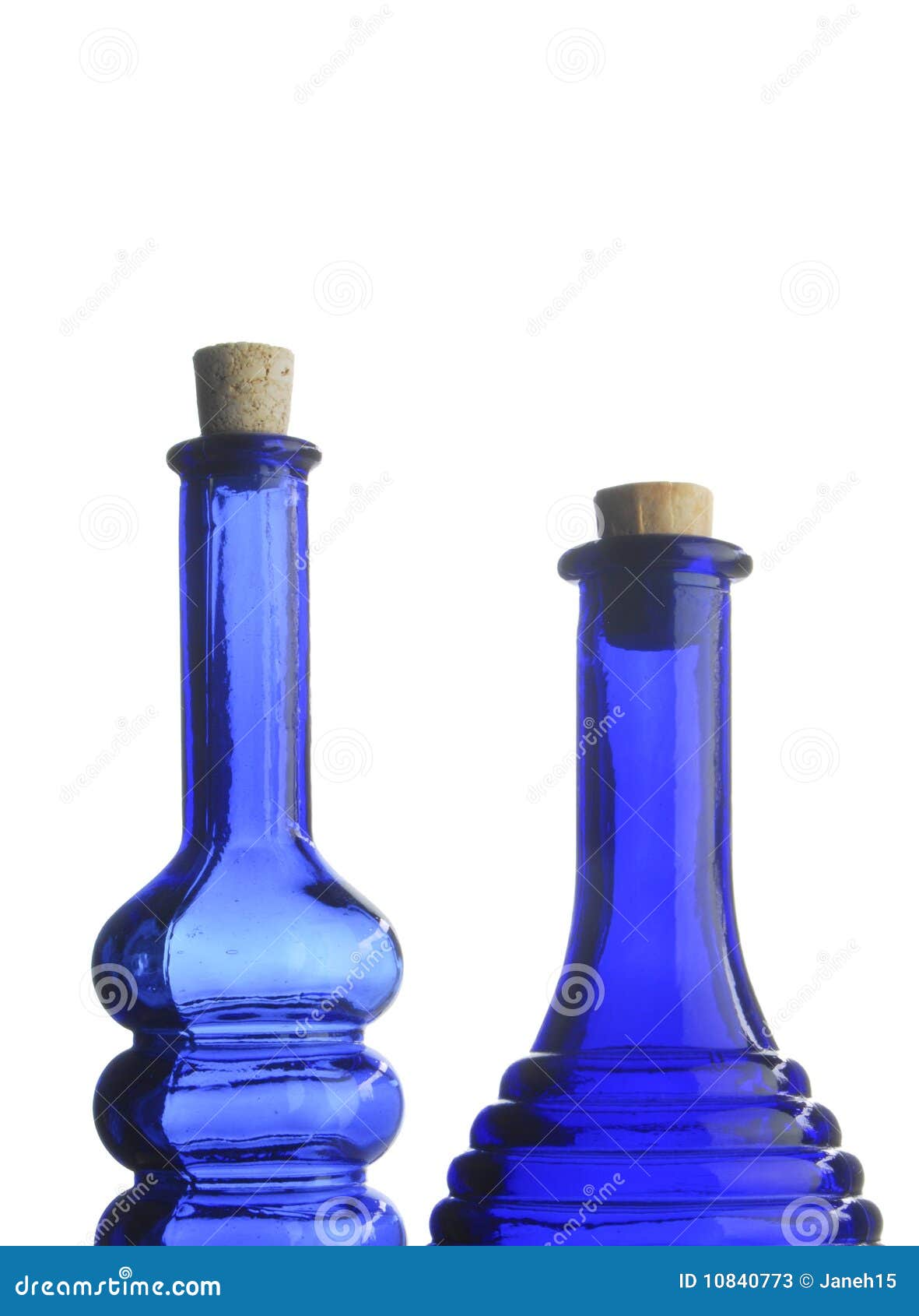 Botellas azules imagen de archivo. Imagen de extracto - 10840773