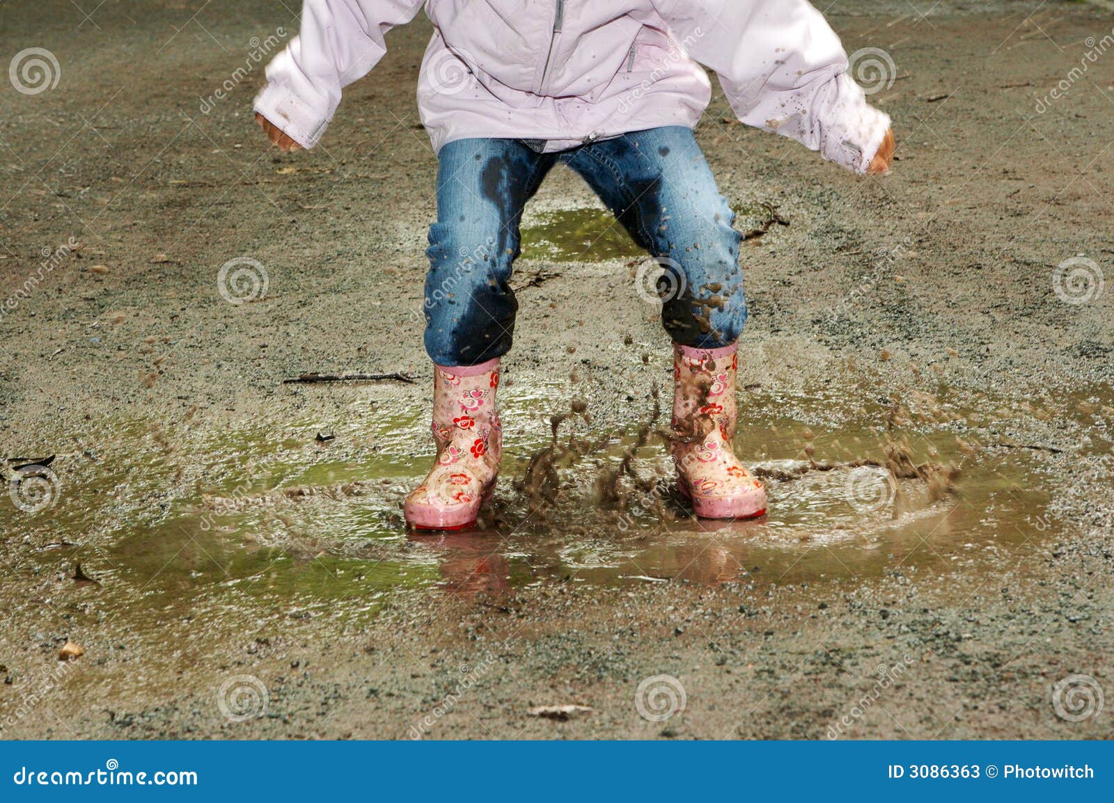 Both feet in the puddle stock image. Image of play, pool - 3086363