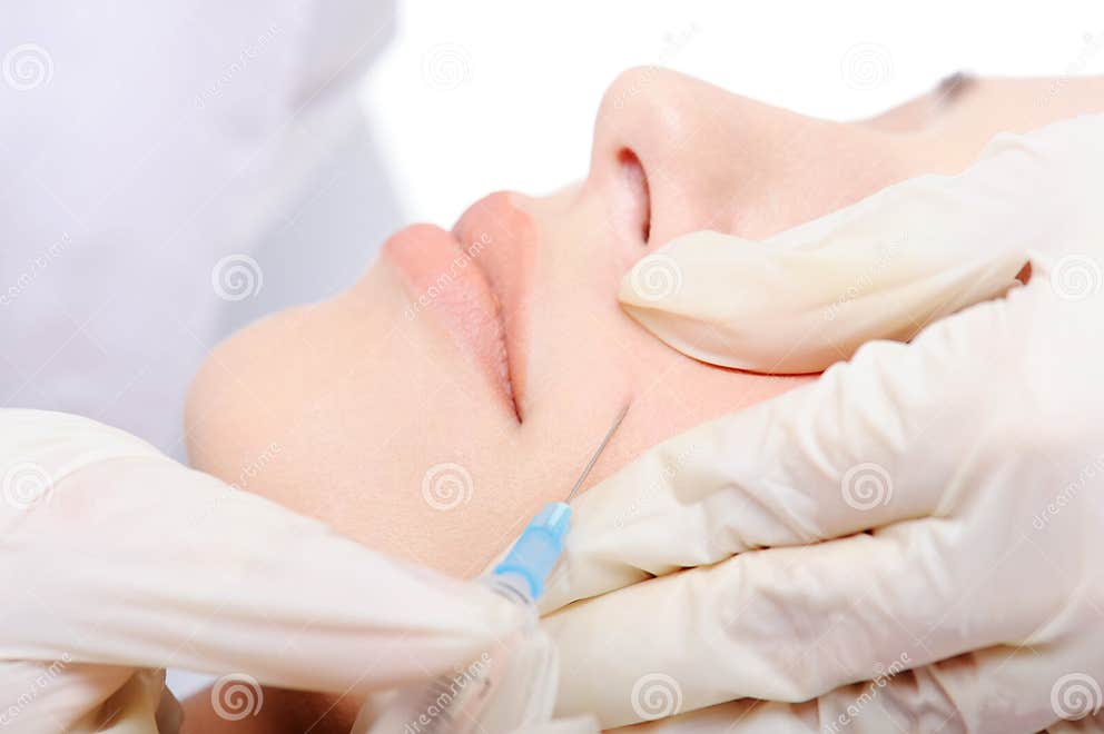 Botox shot in the cheek stock photo. Image of health - 10814612