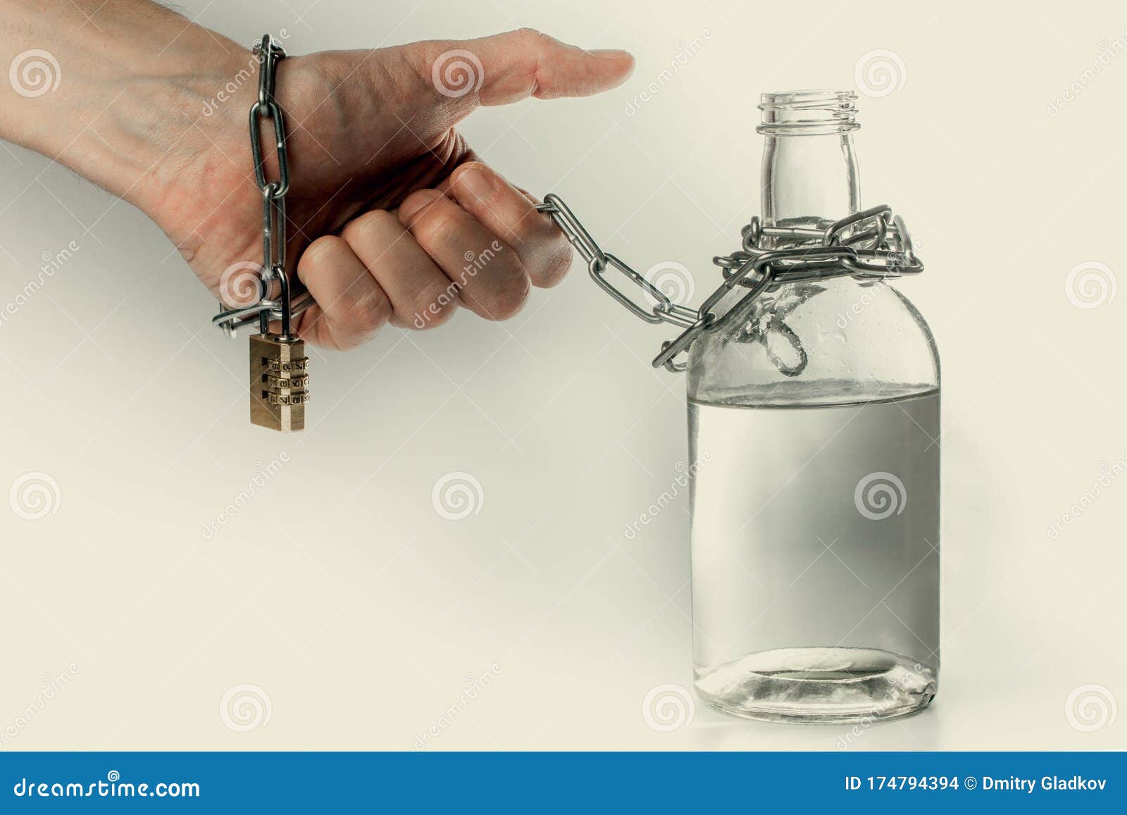 Bottle with Alcohol and Chain Stock Photo - Image of drink, alcohol ...