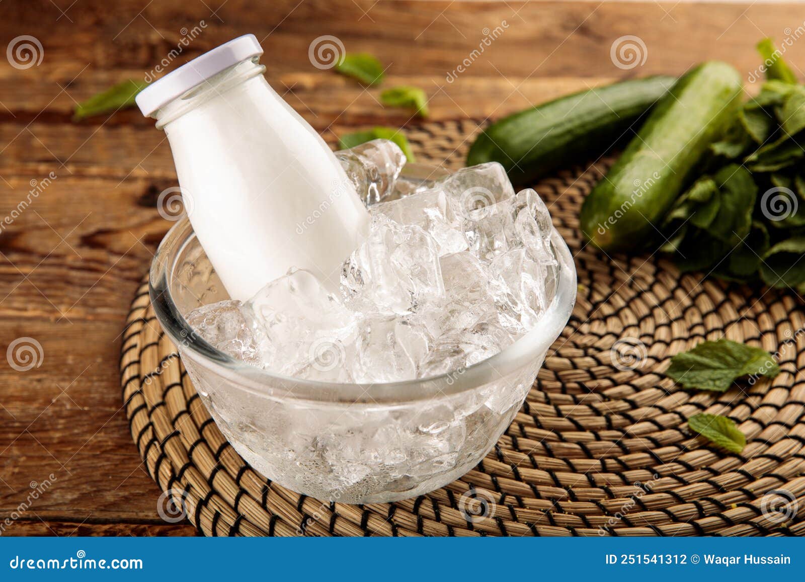A Bottle of AYRAN YOGHURT DRINK Served in Iced Cube Bowl Side View on ...