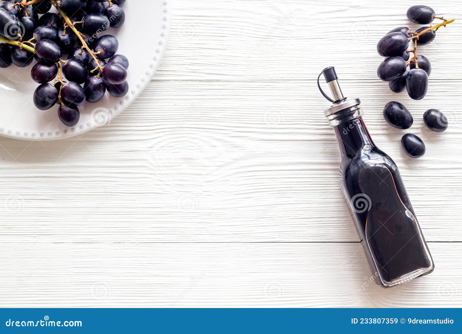 Bottle of Balsamic Vinegar with Bunch of Fresh Grapes Stock Image ...