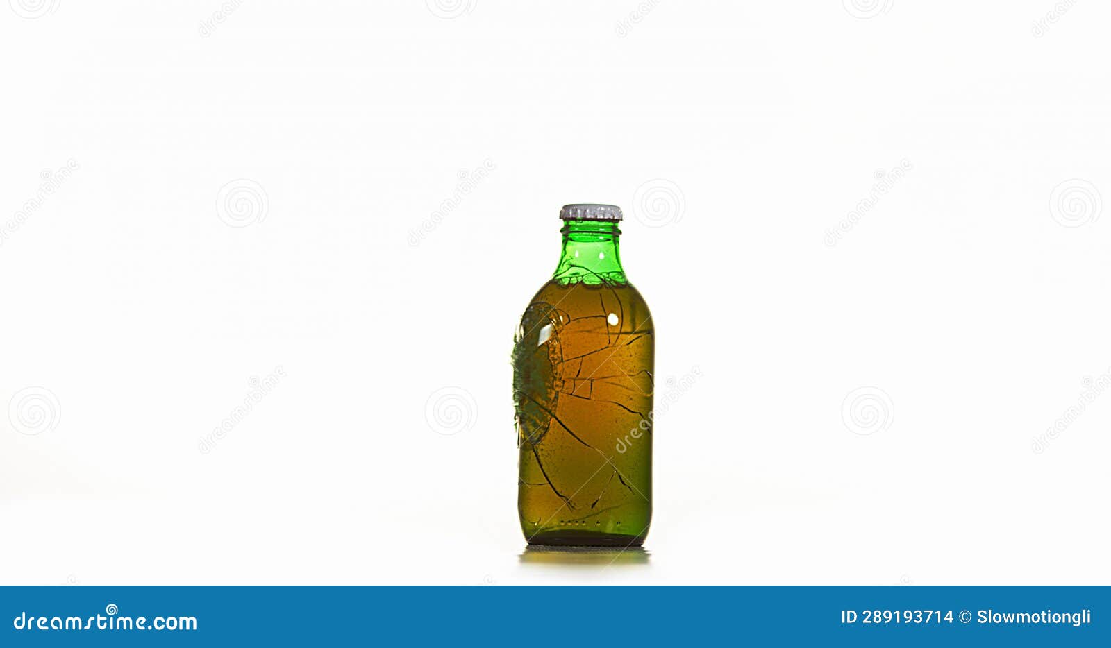 Bottle of Beer Breaking and Splashing Against White Background Stock ...
