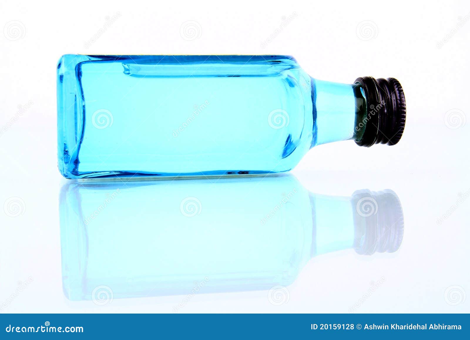 Bottle with blue liquid stock photo. Image of artificial - 20159128