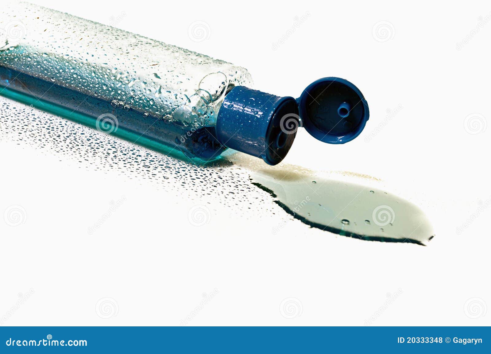 Bottle Of Blue Liquid That Wet Stock Photo - Image of transparent, dewy ...