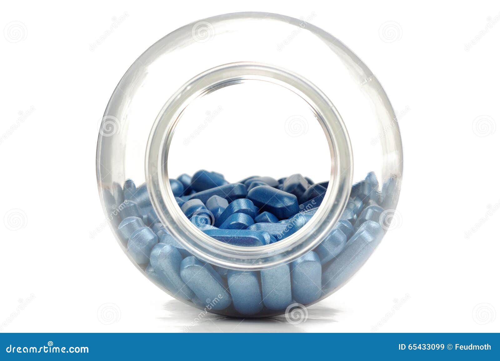 Bottle with blue tablets stock image. Image of capsules - 65433099