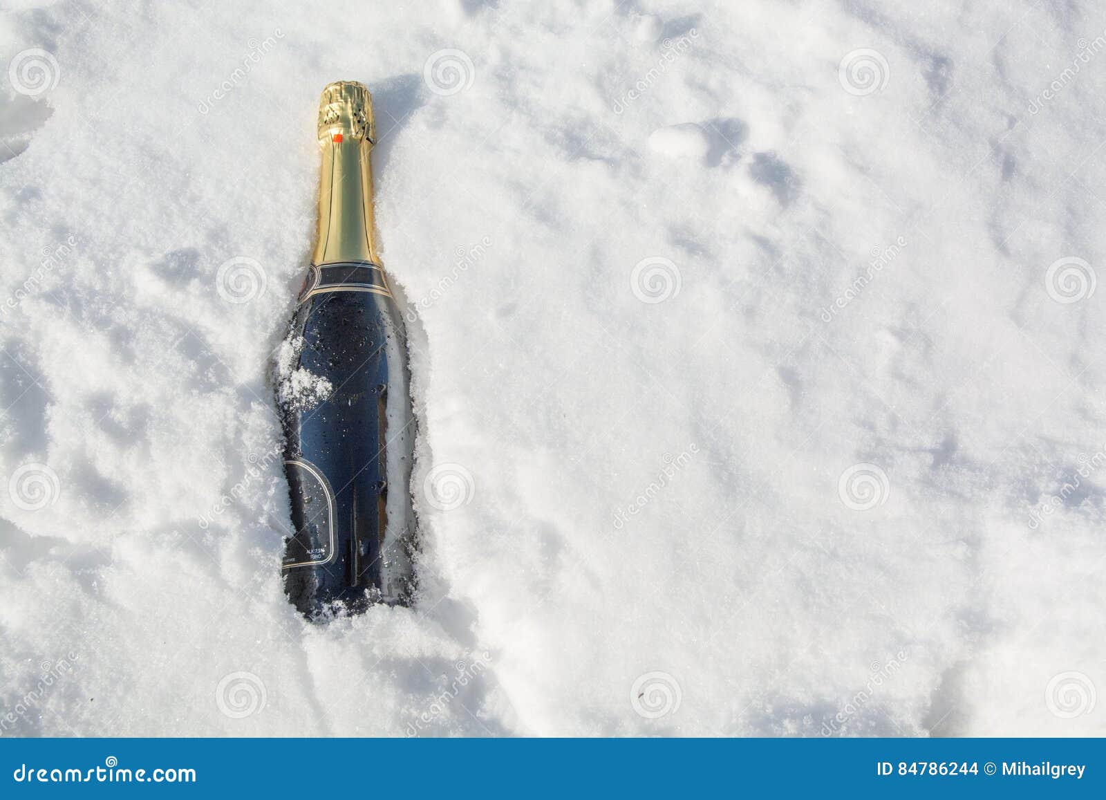 Bottle of Champagne is Lying in Snow. Stock Photo - Image of drink ...