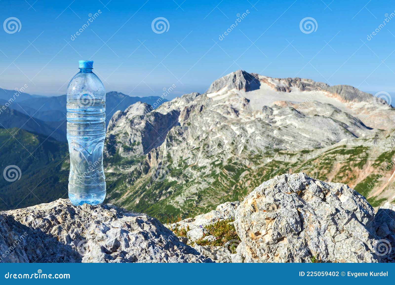 A Bottle of Clean Water in the Mountains Stock Photo - Image of ...