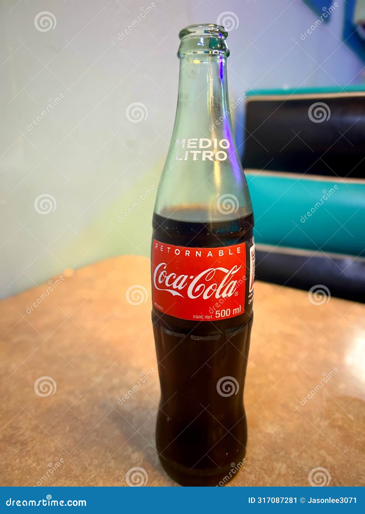 Bottle of Coca Cola editorial photo. Image of spanish - 317087281
