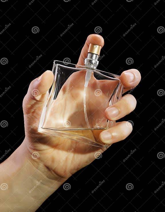 Bottle of Cologne in a Hand at the Man Stock Photo - Image of fragrant ...