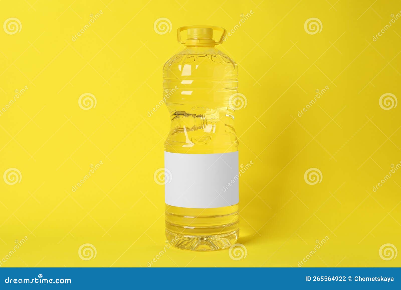 Bottle of Cooking Oil on Yellow Background Stock Photo - Image of corn ...