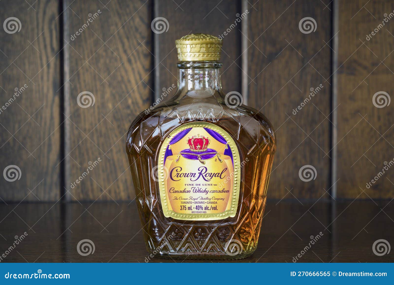 Bottle of Crown Royal Canadian Whiskey on Table Editorial Image - Image ...