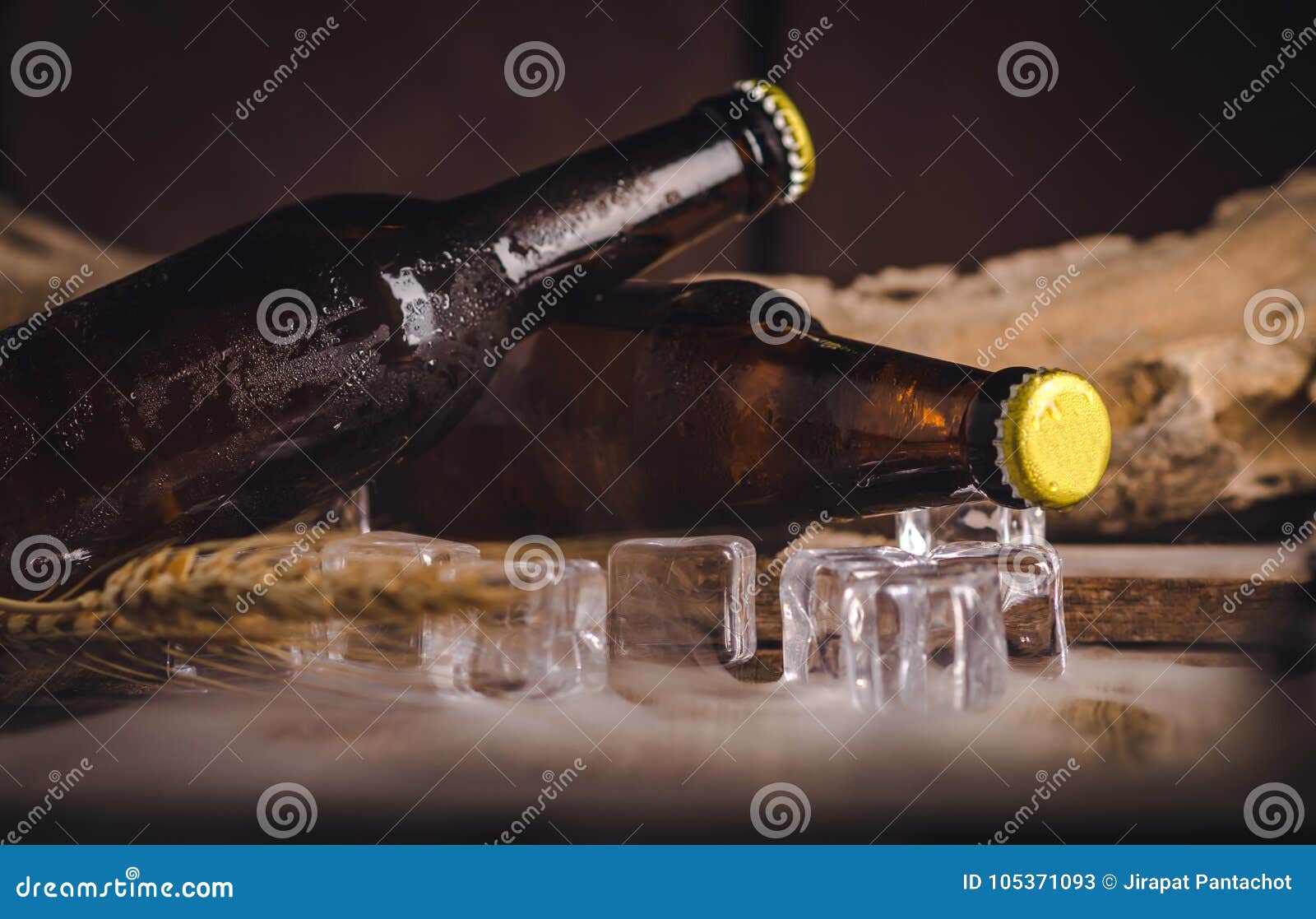 Bottle Draft Beer and Ice on Wooden Table Stock Image - Image of lager ...