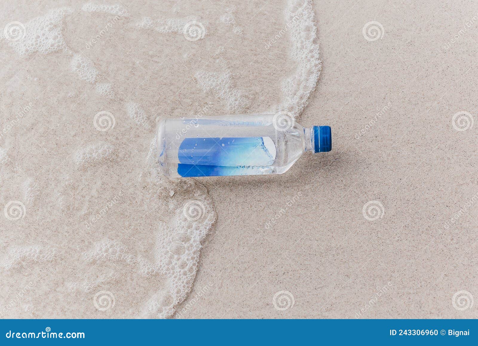 Bottle of Drinking Water on Beach Near the Sea. Stock Photo - Image of ...