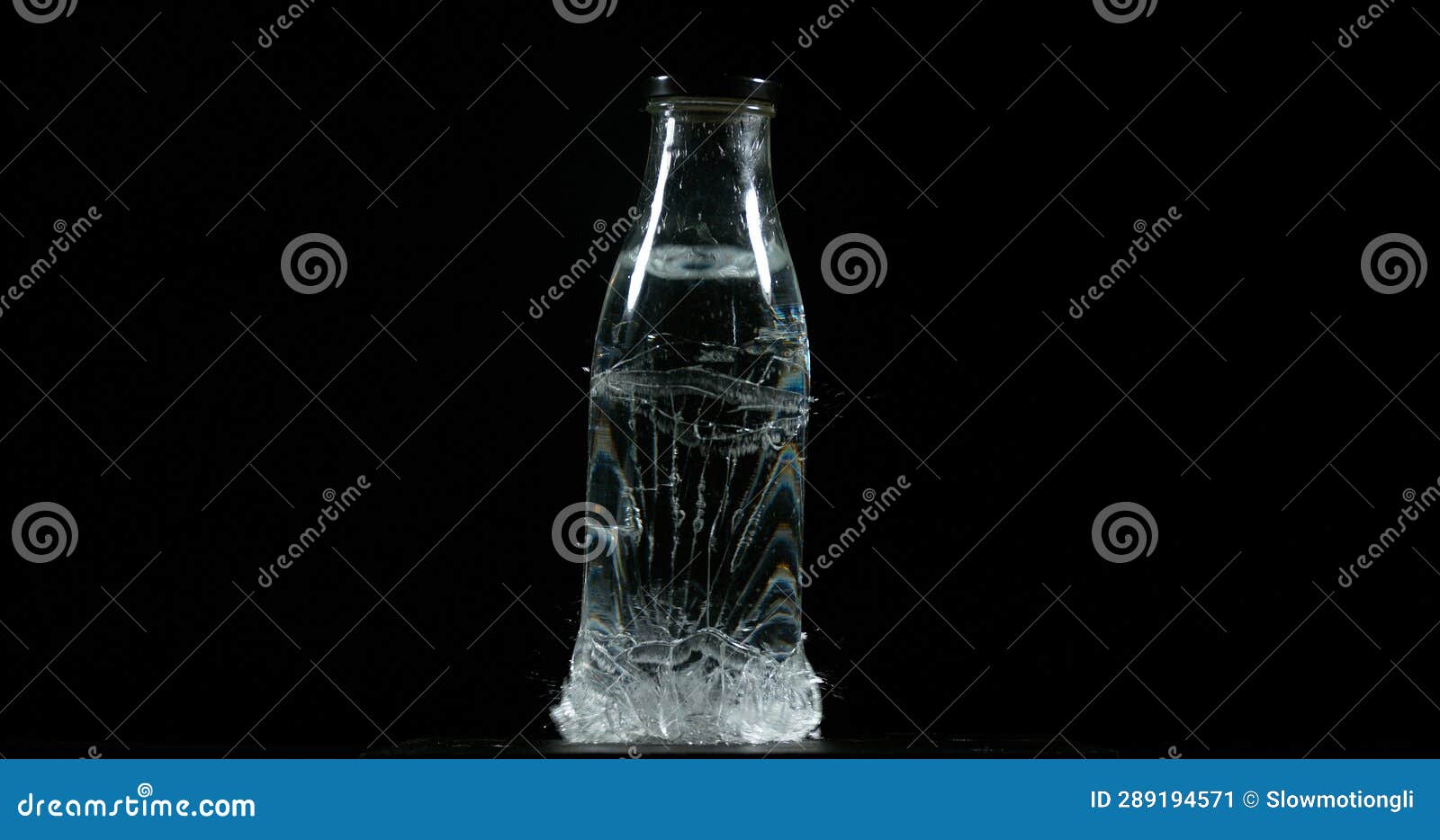 Bottle Falling and Exploding on Black Background Stock Image - Image of ...