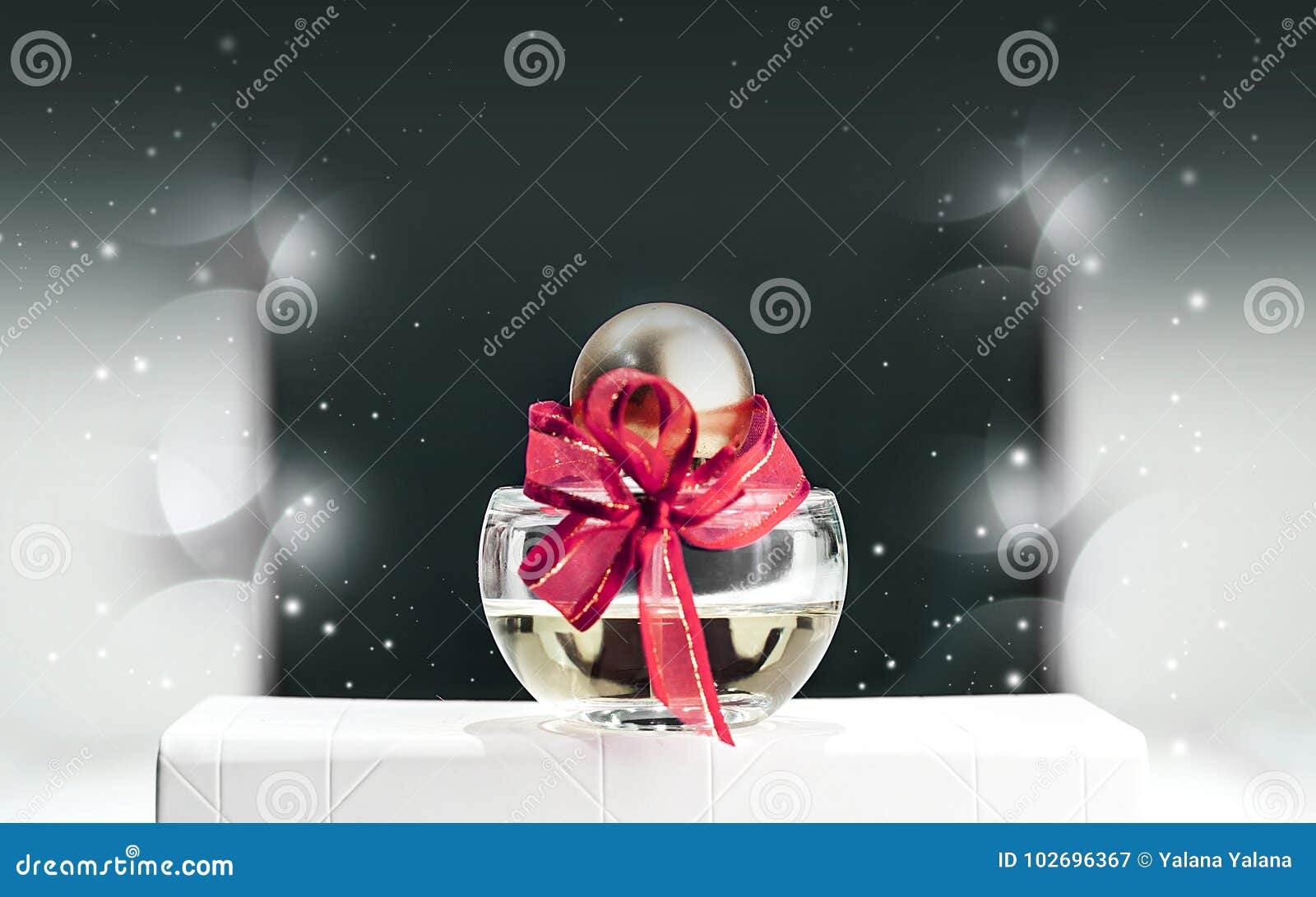 Bottle of Perfume on a Stand on a Green Background Stock Image - Image ...