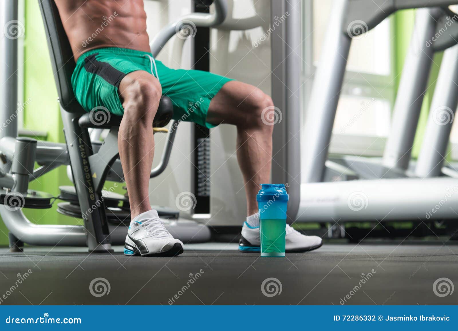Bottle on Floor and Bodybuilder Legs Stock Photo - Image of club ...