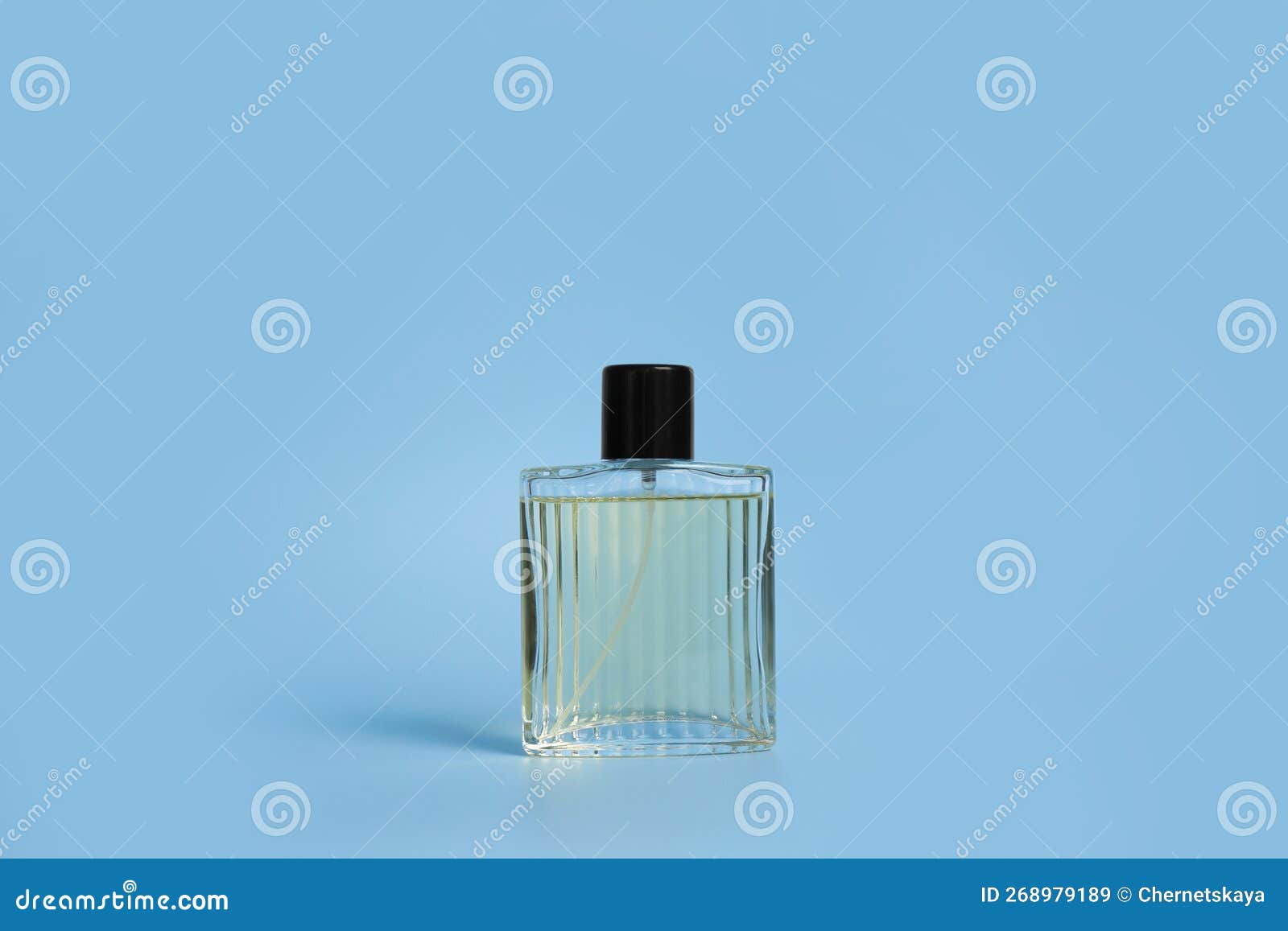 Bottle of Fragrant Perfume on Light Blue Background Stock Image - Image ...