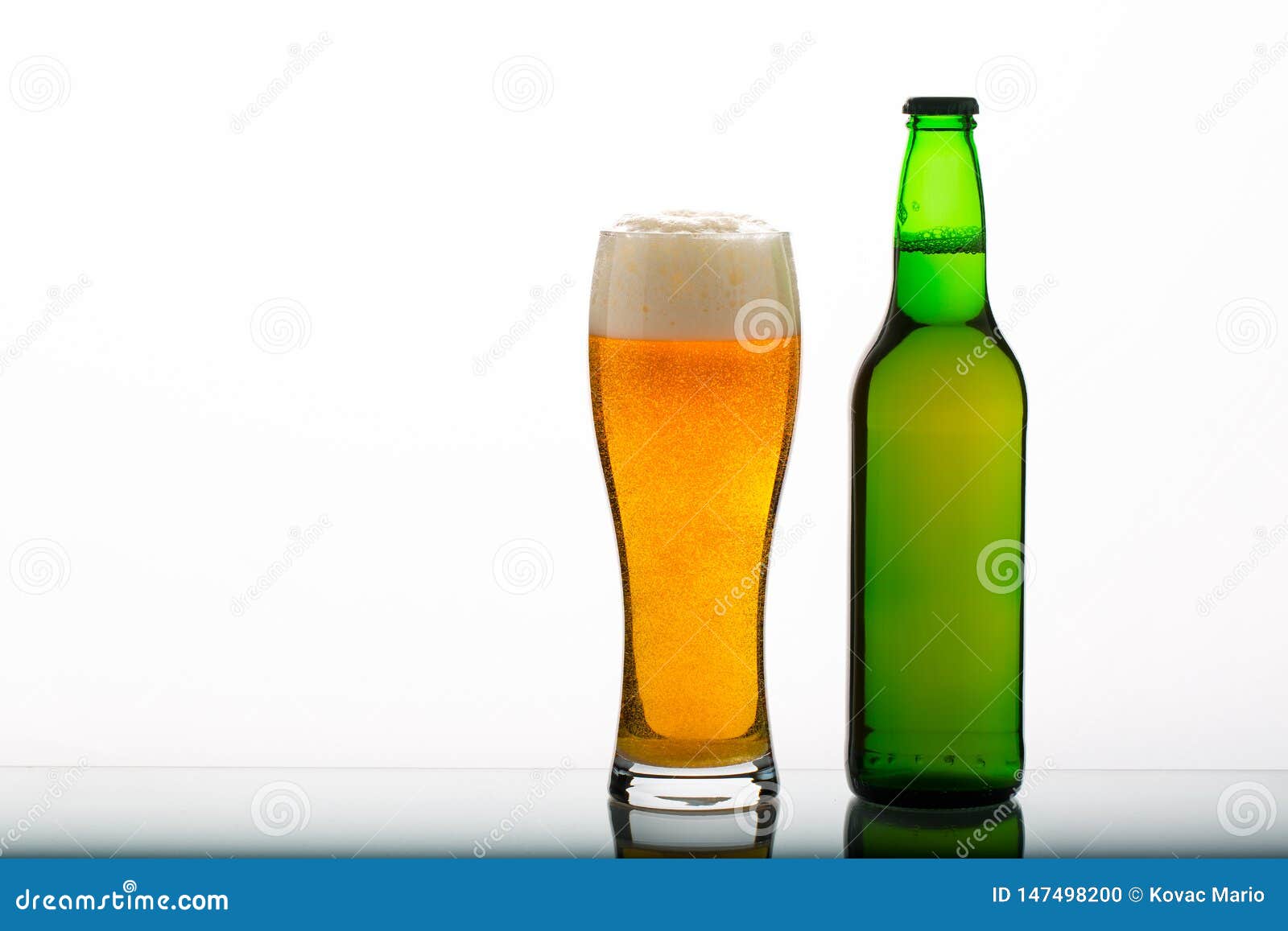 Beer glass and bootle stock photo. Image of alcohol - 147498200