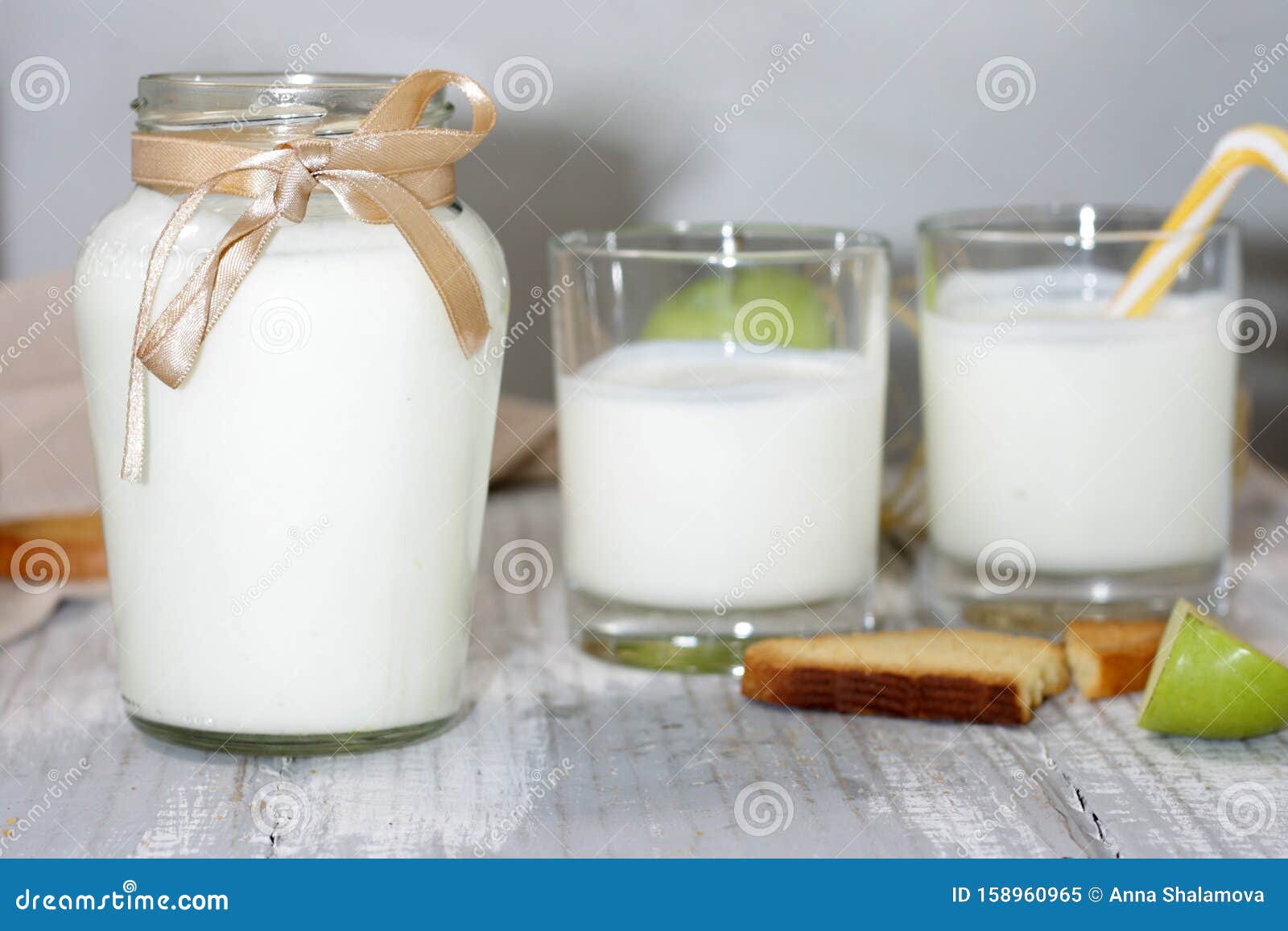 Bottle and Glasses with Refreshing Fresh Kefir on a Light Table with ...