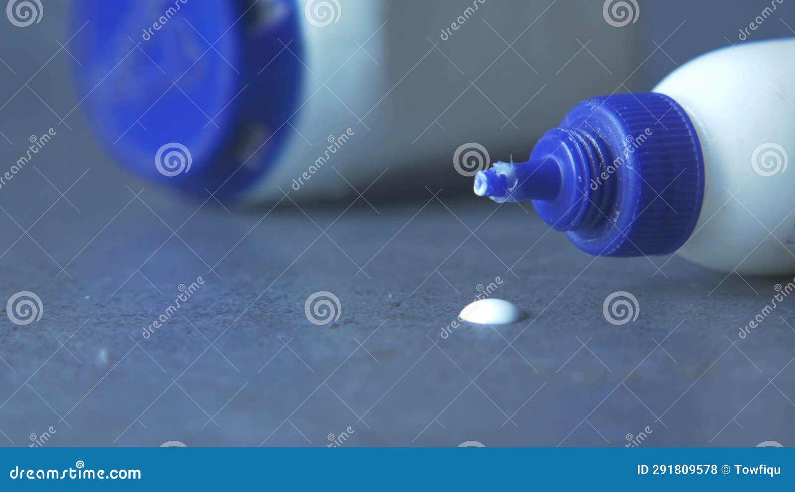 Bottle of Glue Spilling on Black Background . Stock Footage - Video of ...