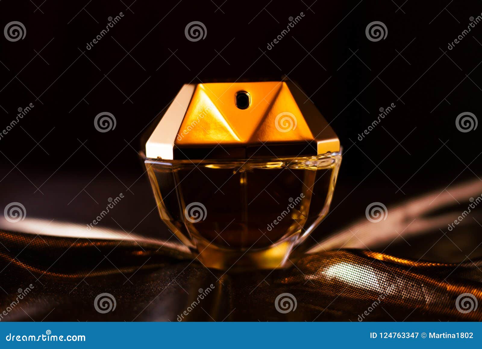 Golden perfume stock image. Image of glamour, beauty - 124763347
