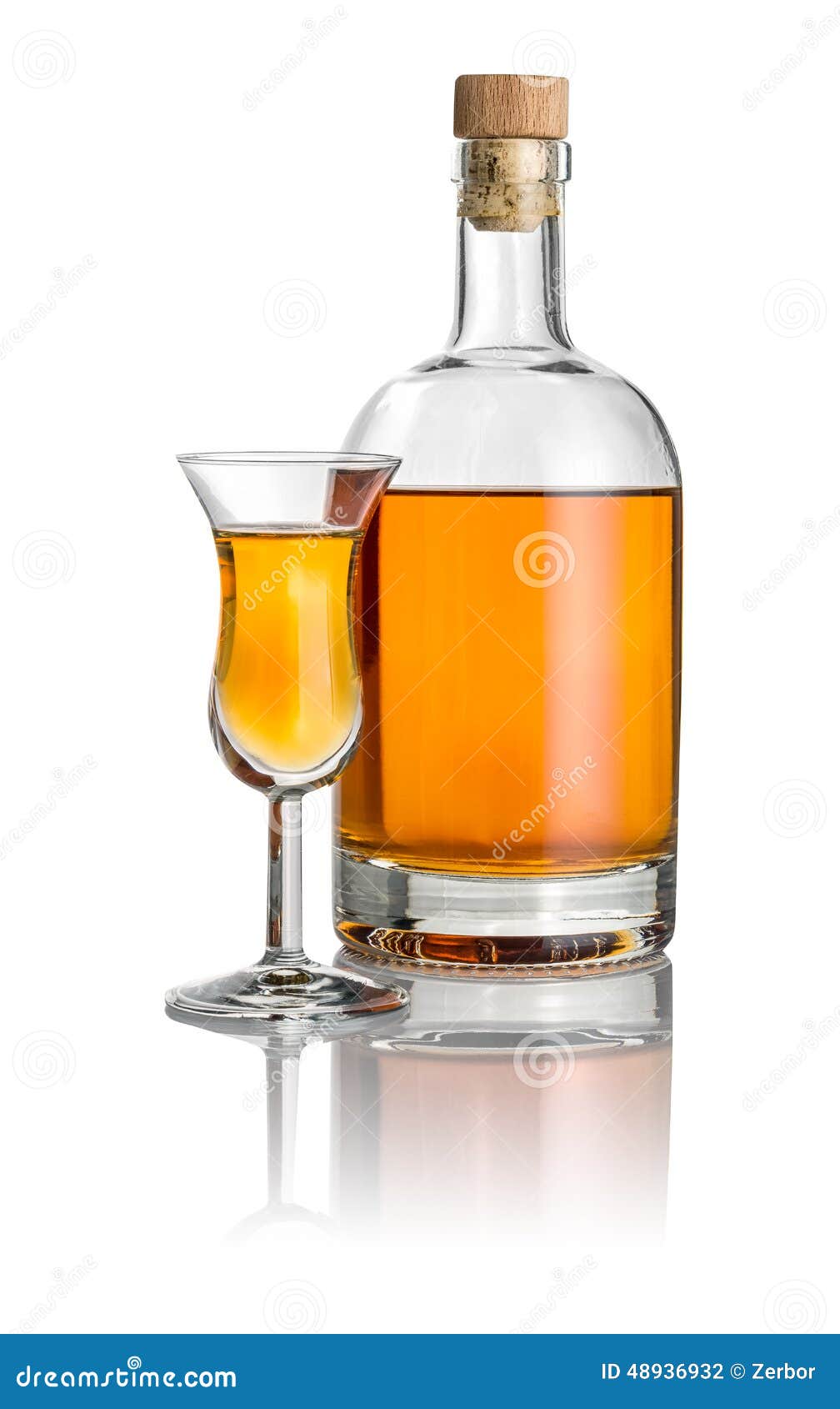 Bottle and High Stem Glass Filled with Amber Liquid Stock Photo - Image ...