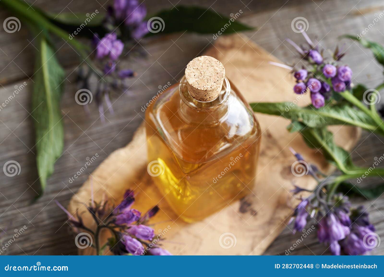 A Bottle of Homemade Comfrey Root Tincture Stock Photo - Image of ...