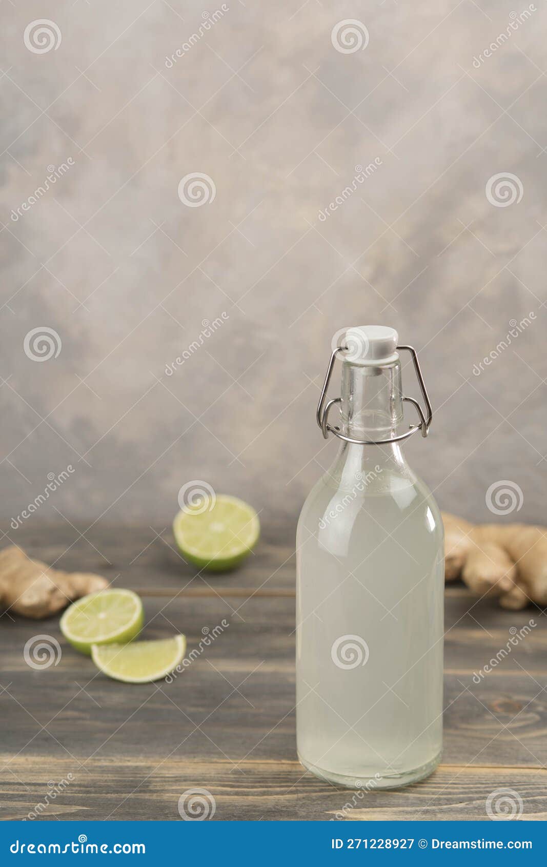 Bottle With Homemade Ginger Ale, Lemon And Gingerroot On Gray ...