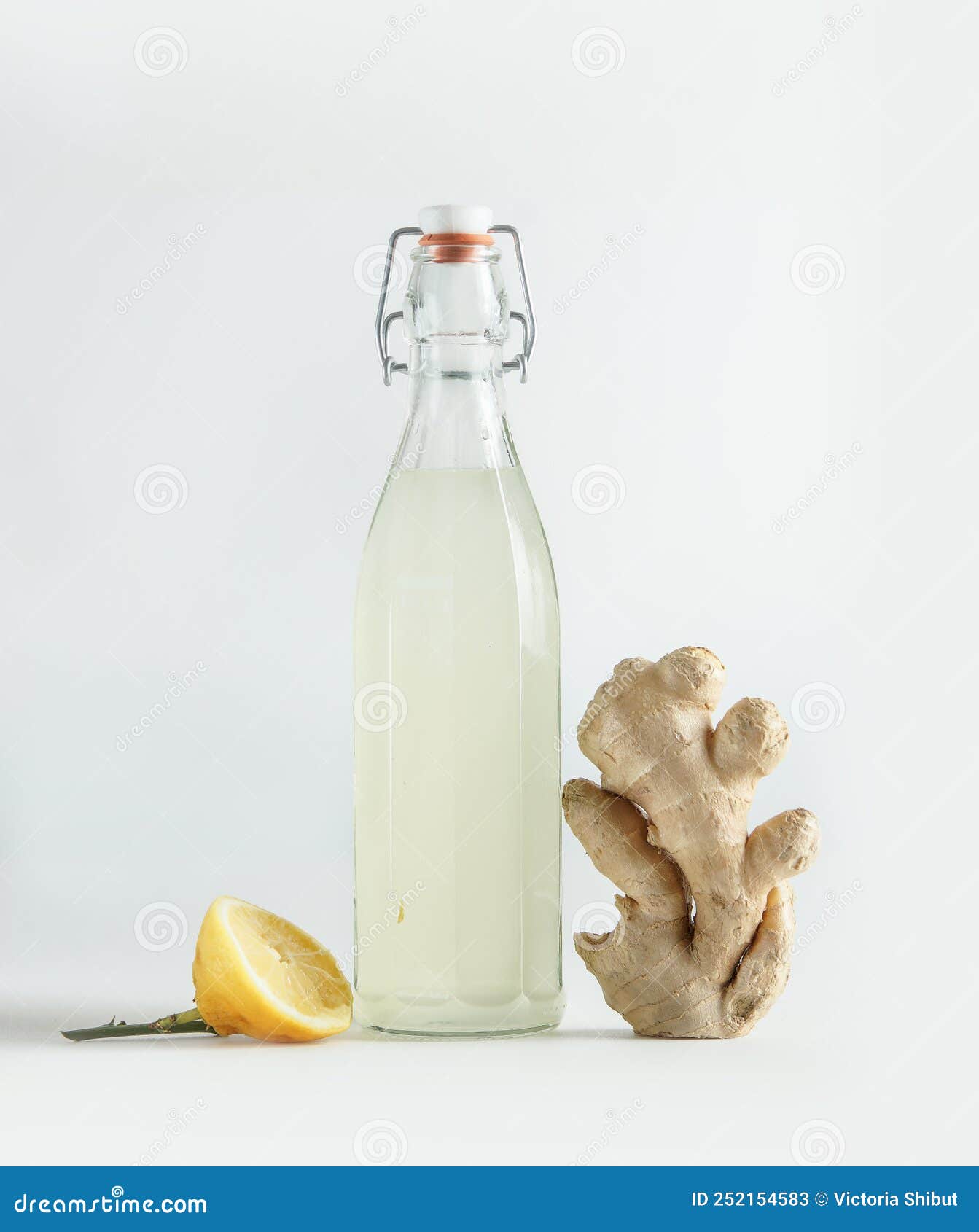 Bottle with Homemade Ginger Ale, Lemon and Gingerroot at White ...