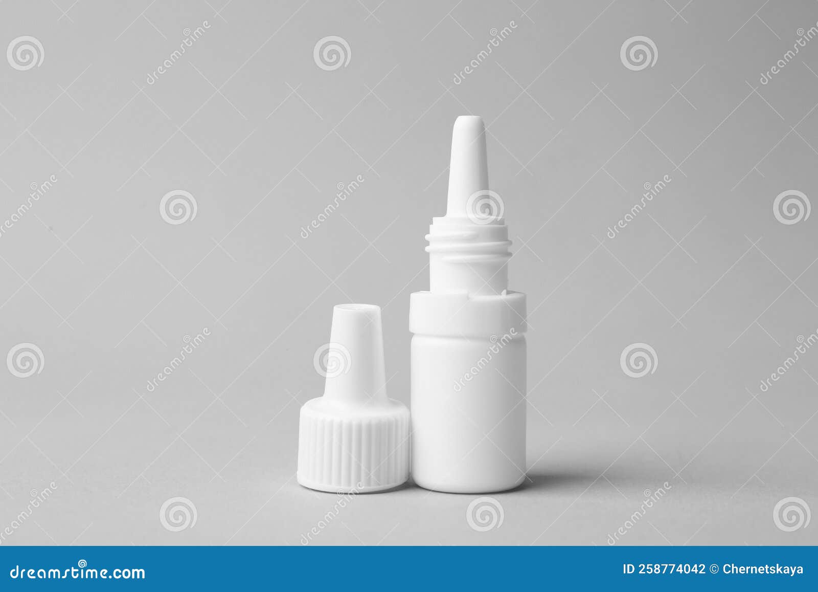 Bottle of Medical Drops on Grey Background Stock Photo - Image of ...