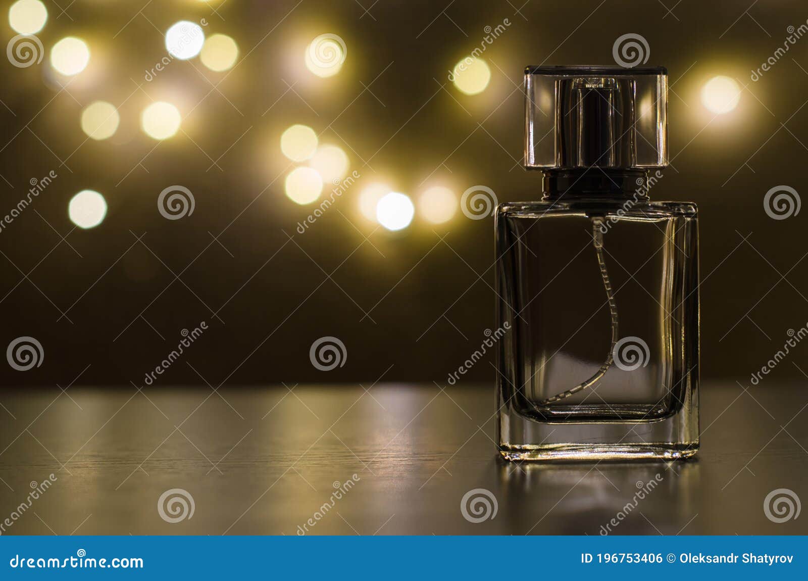 Bottle of Men`s Perfume on a Background of Festive Lights Stock Photo ...