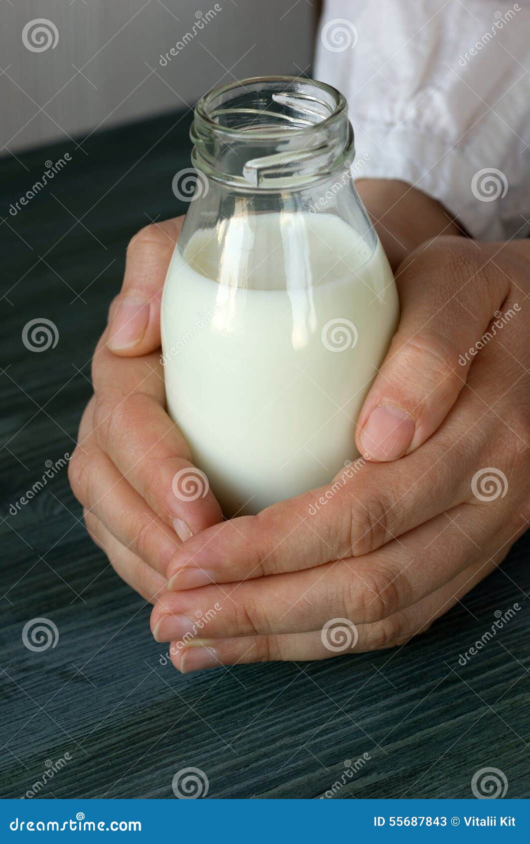 Bottle of Milk in His Hand. Stock Image - Image of fresh, female: 55687843