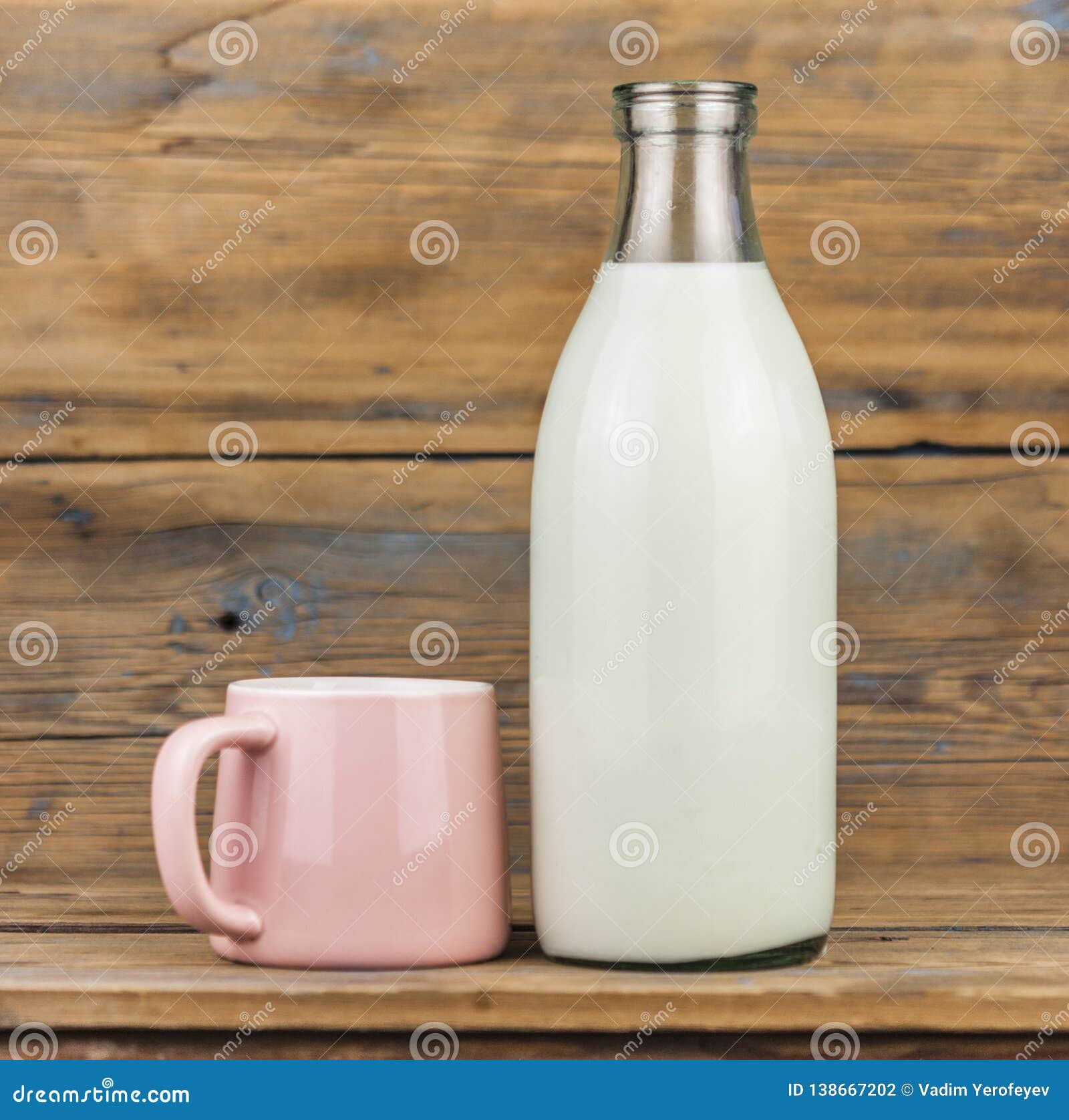 Milk Cup and Bottle on Wooden Table Stock Photo - Image of beverage ...