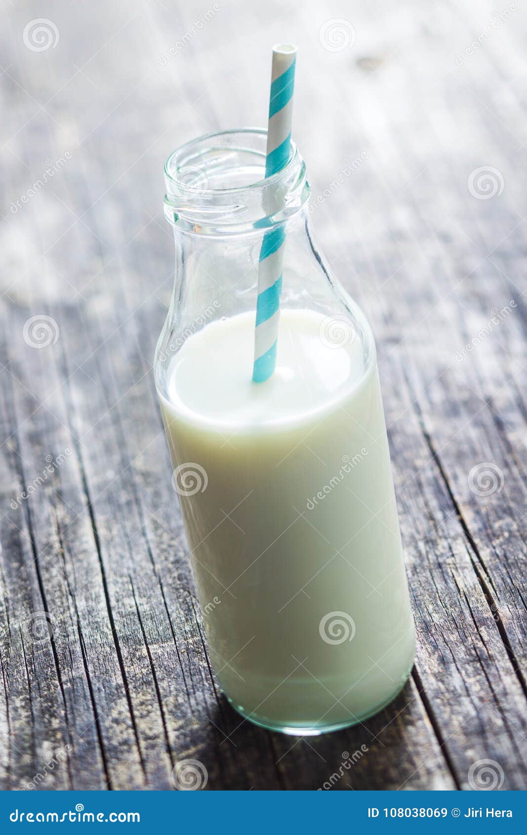 Bottle milk with straw. stock image. Image of liquid - 108038069