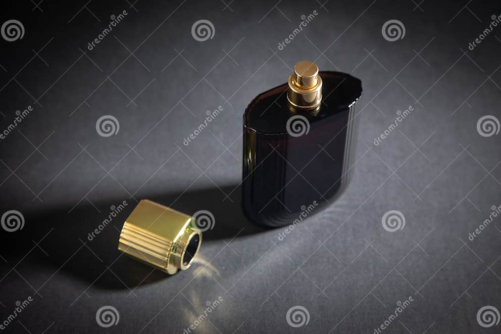 Bottle of Perfume on the Black Background Stock Photo - Image of ...
