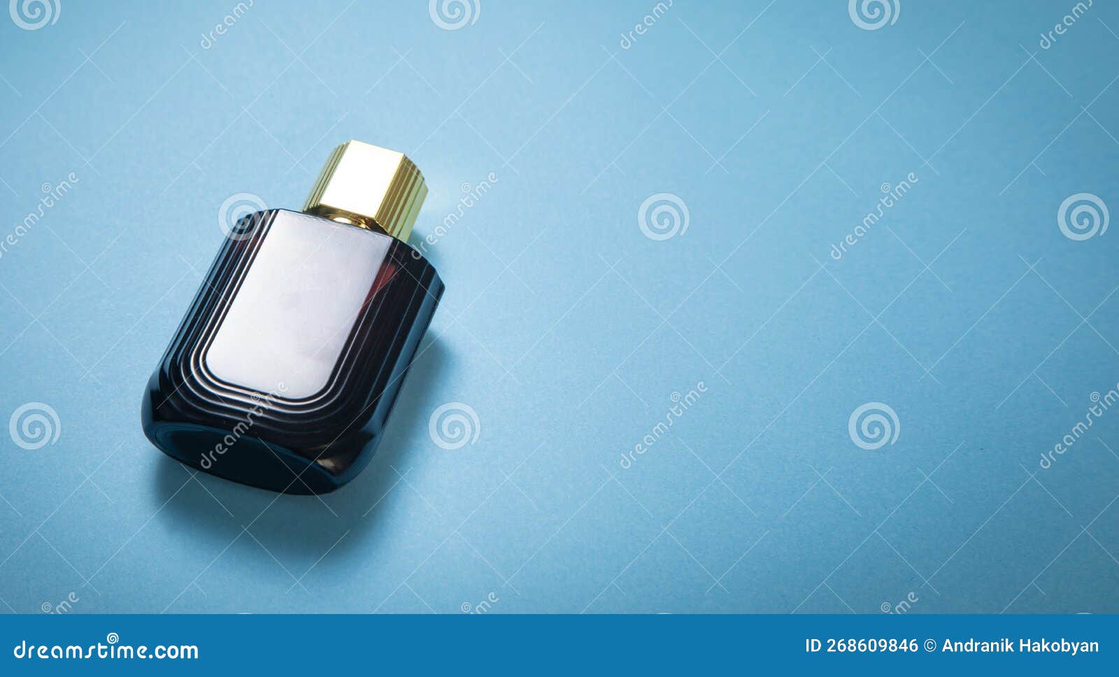 Bottle of Perfume on the Blue Background Stock Photo - Image of bottle ...
