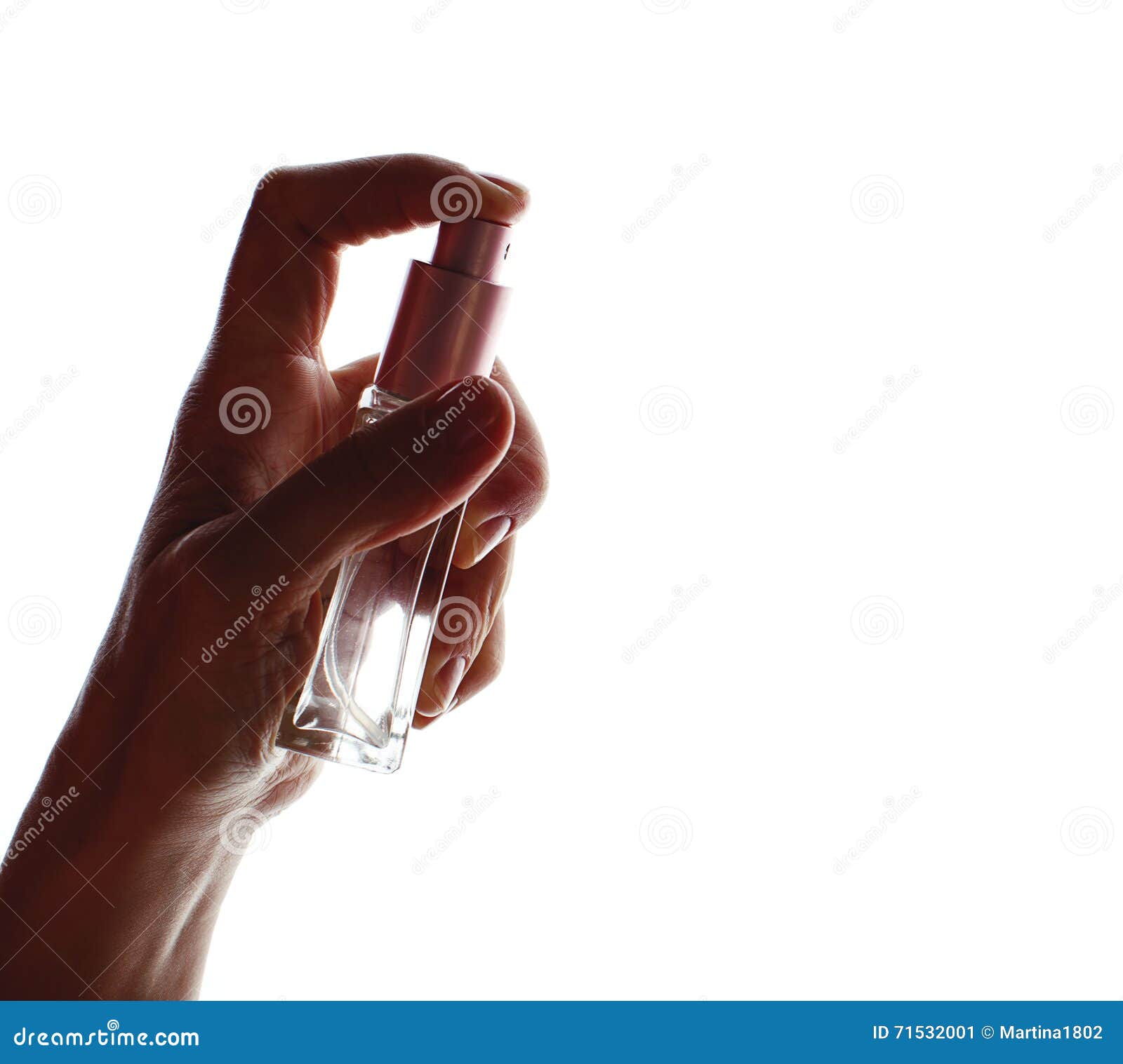 Bottle of Perfume in hand stock image. Image of parfum - 71532001