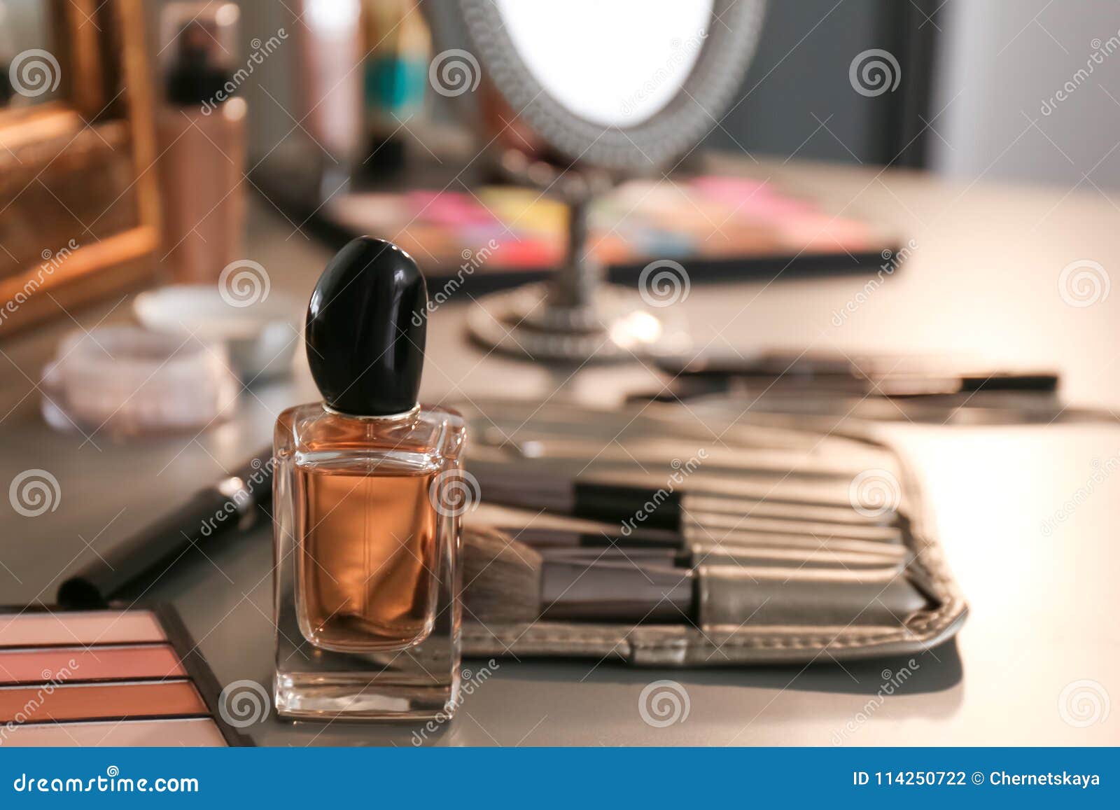 Bottle of Perfume and Makeup Products Stock Photo - Image of products ...