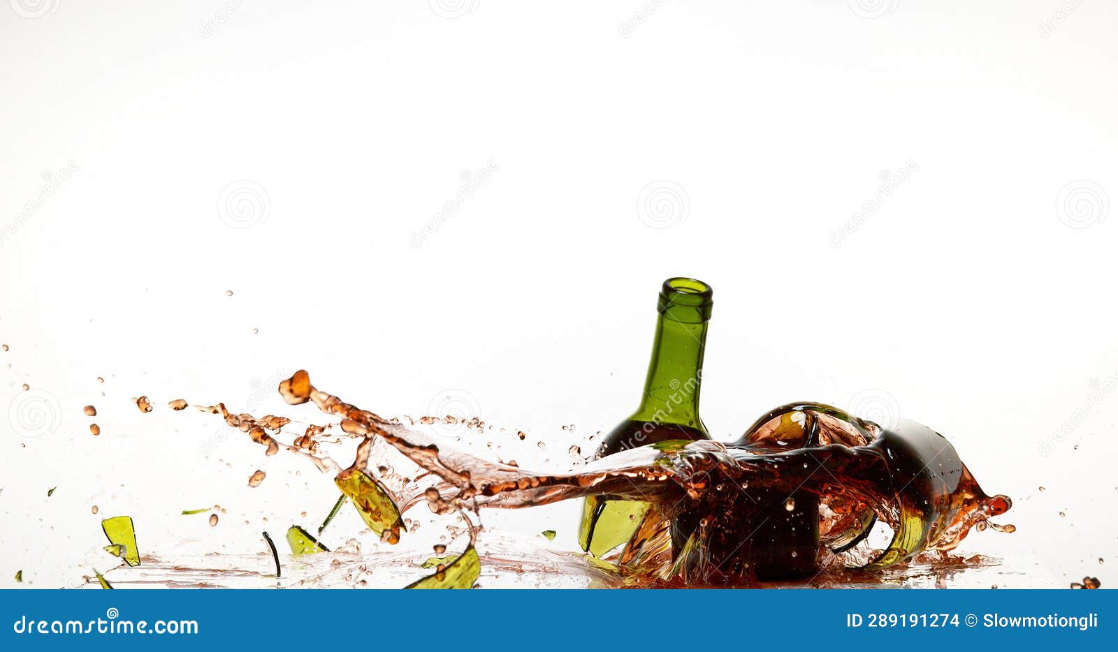 Bottle of Red Wine Breaking and Splashing Against White Background ...