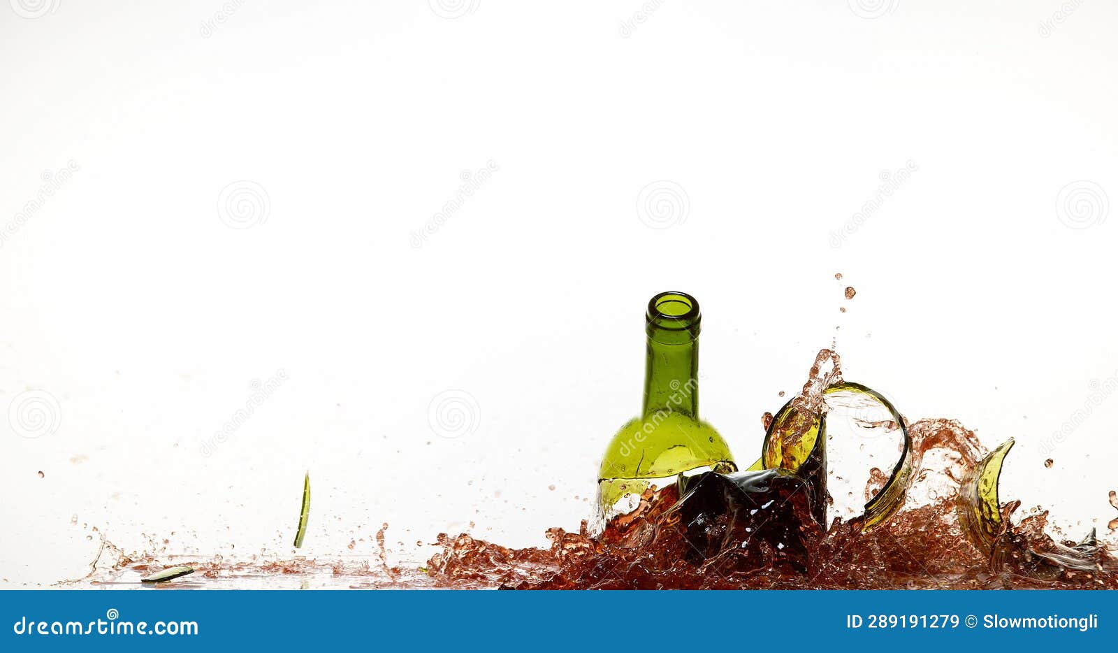 Bottle of Red Wine Breaking and Splashing Against White Background ...
