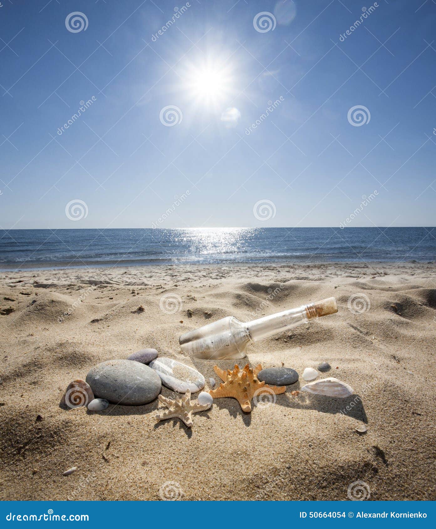 Bottle on a sand stock photo. Image of idyllic, object - 50664054