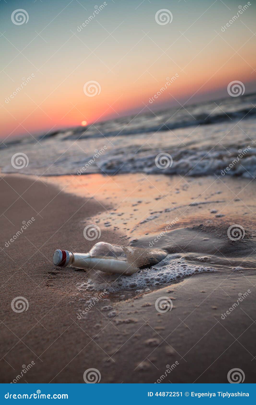 Bottle in the sea stock image. Image of paper, sunset - 44872251