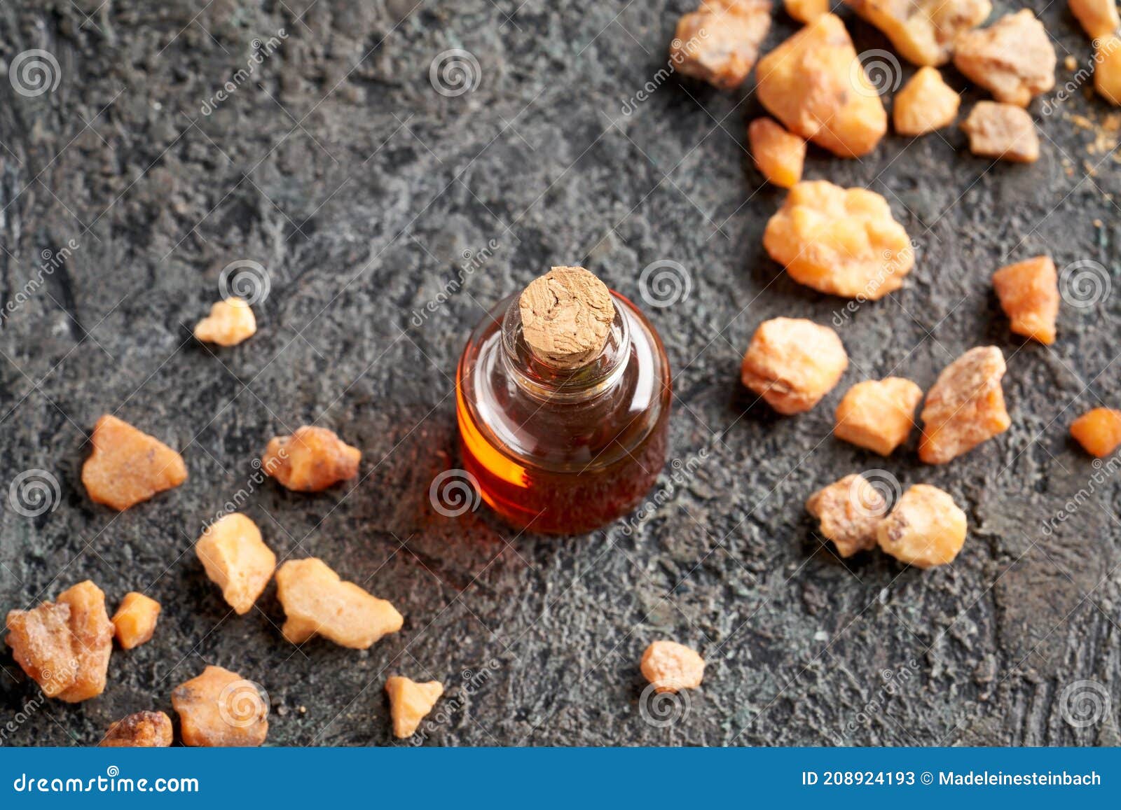 A Bottle of Styrax Benzoin Essential Oil and Benzoin Resin Stock Image ...