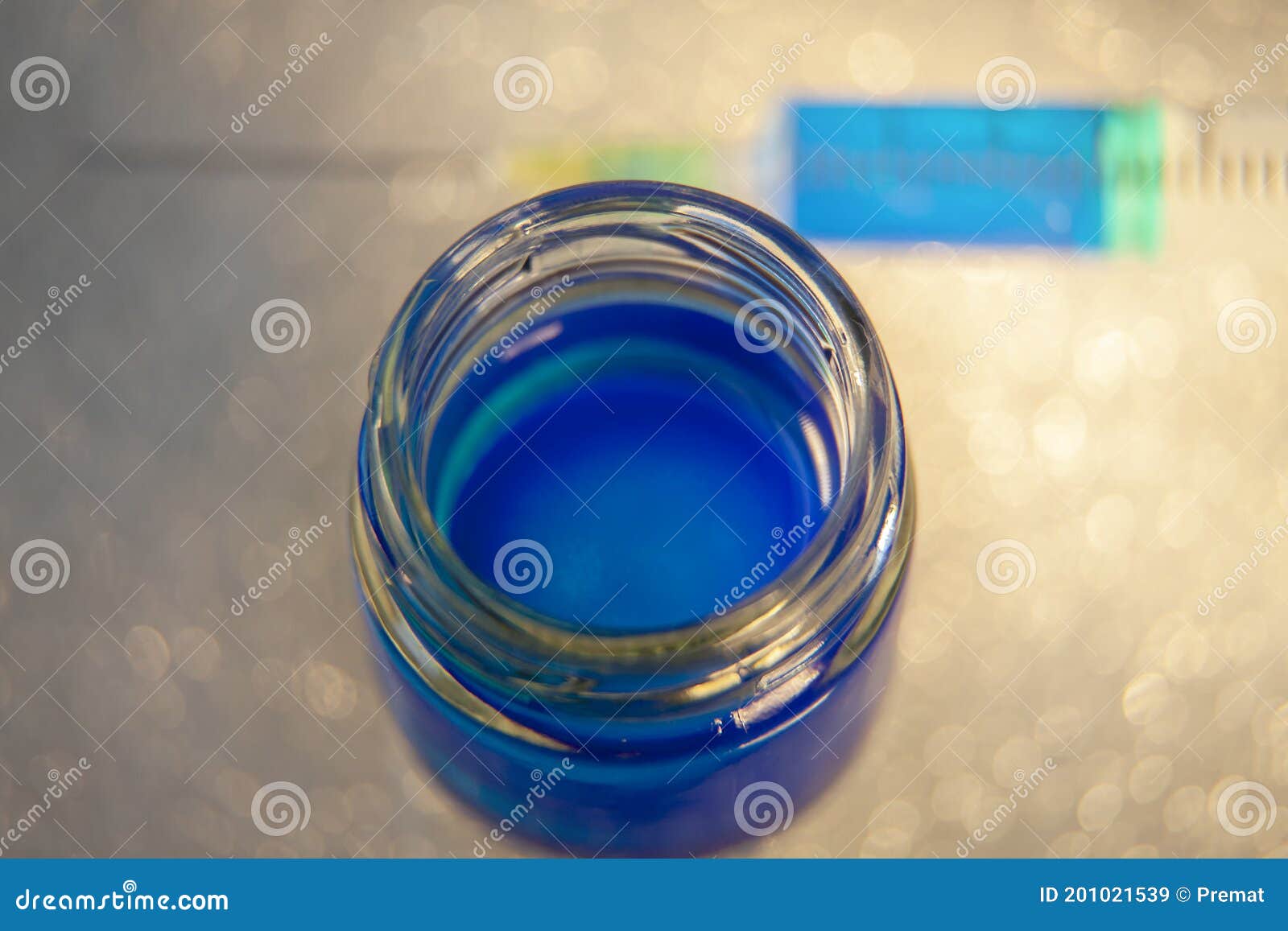 Bottle and Syringe with Same Liquid Stock Image - Image of care, blue ...
