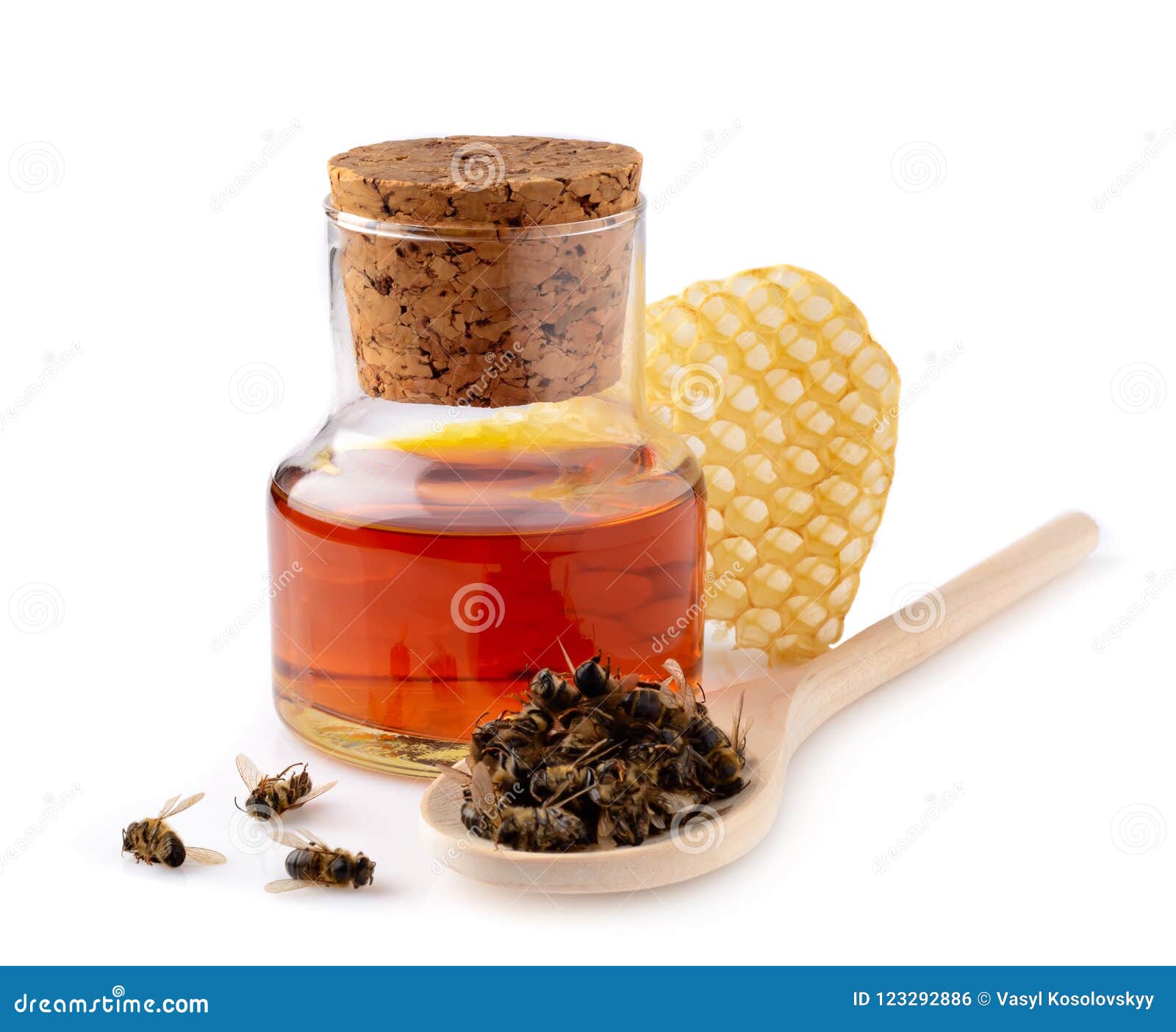 A Bottle of Tinctures on Dead Bees and Dead Bees in a Wooden Spoon ... A Bottle of Tinctures on Dead Bees and Dead Bees in a Wooden Spoon ...