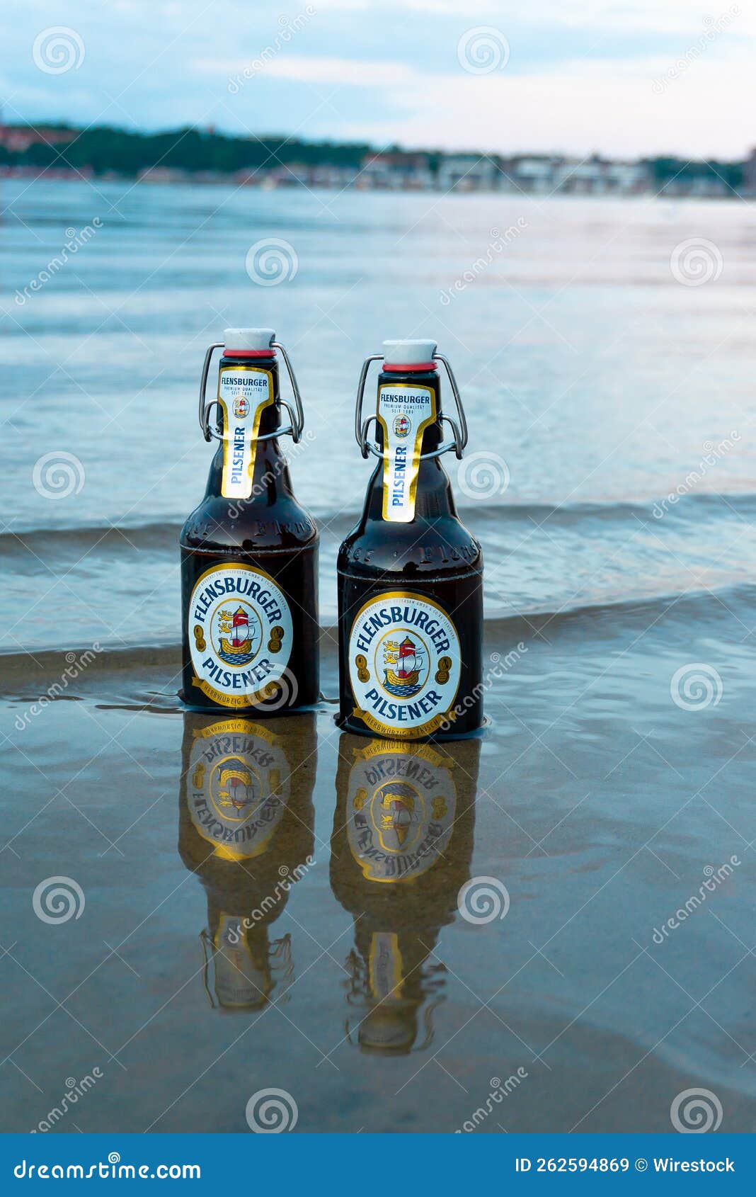 Bottle of Two Flensburger Pilsener Beers on the Seashore Editorial ...