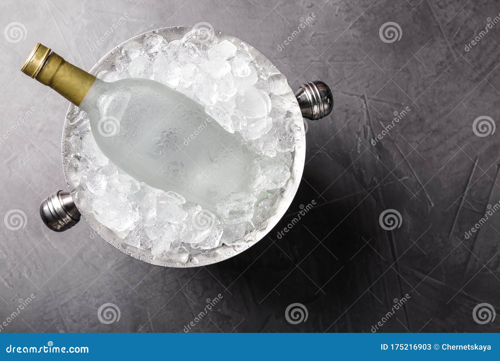 Bottle of Vodka in Metal Bucket with Ice on Grey Table, Top View Stock ...