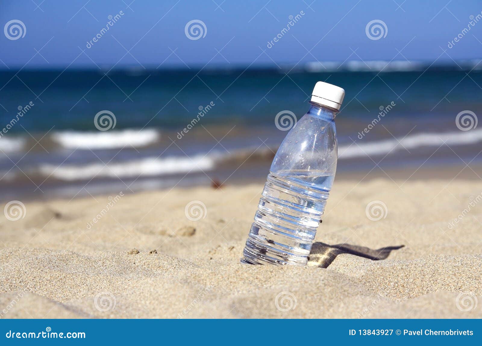 Bottle with water on beach stock image. Image of beverage - 13843927