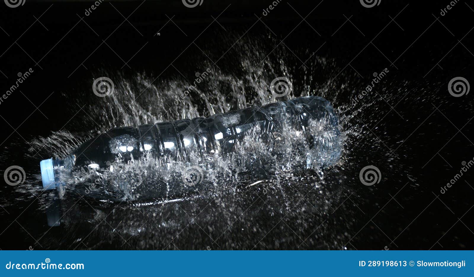 Bottle of Water Falling on Water Against Black Background Stock Image ...